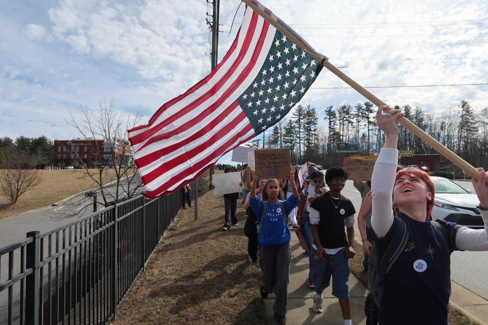 ‘ICE OUT’: T.C. Roberson High students walk out in ICE protest ...